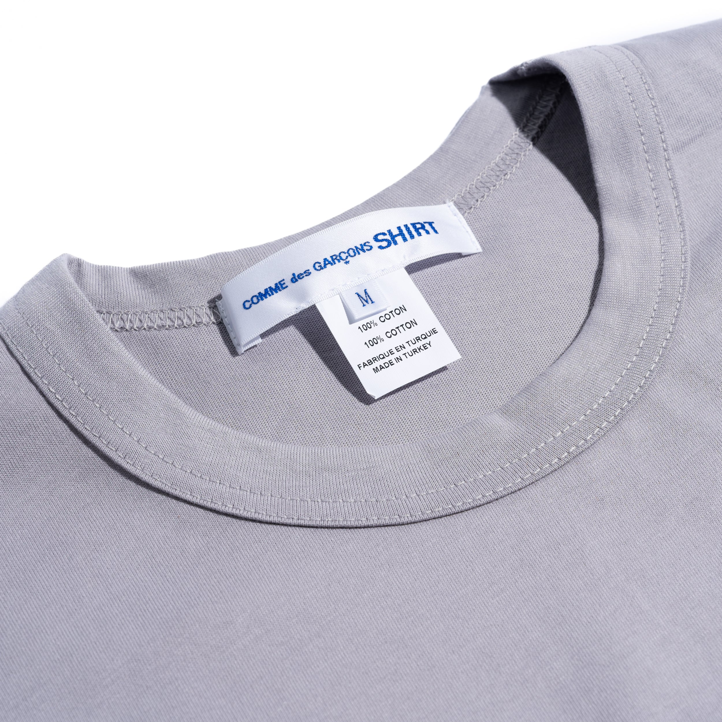CDG SHIRT Oversized Logo Tee Stone FO-T023-S25-2 – Capsule CDG SHIRT Oversized Logo Tee Stone FO-T023-S25-2 – Capsule